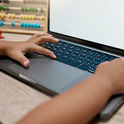 E learning, mockup laptop and hands of kid with digital tech for online ...