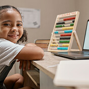 Laptop, mockup or girl learning math at home via elearning or online ...