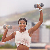 Fitness, portrait and woman weightlifting with dumbells for ...