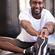 Fitness, stretching and portrait of black man in gym for exercise ...