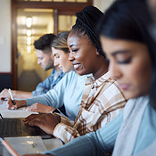 Black woman, education and student with university, study with laptop ...