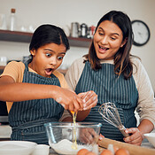 Family, cooking breakfast and child learning in kitchen for chef ...