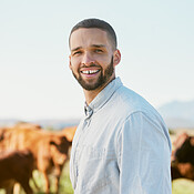 Cows, farm and black man portrait happy about cattle agriculture ...