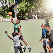 Basketball court, team sports and black people together for fitness ...