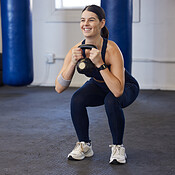 Fitness, exercise and woman doing weight lifting in gym for healthy ...