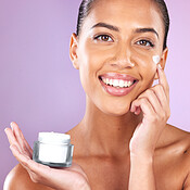 Woman, skincare cream and portrait with smile, cosmetic beauty and ...