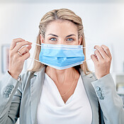 Woman, office portrait and put on mask for covid 19 safety, health and ...