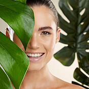 Woman, beauty and skincare portrait with plant for natural skin ...