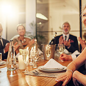 People, party and clapping at restaurant in night with friends ...