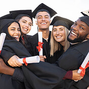 Graduation, group portrait and hug for celebration, success and ...
