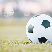 Soccer, ball and field ready for game time or match start in sports ...