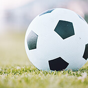 Soccer, ball and field for sports game time or match start in athletics ...