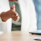 Business woman with a handshake gesture in her office for welcome ...