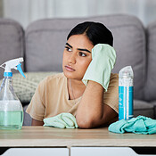 House, cleaning and bored woman thinking, tired and annoyed with ...