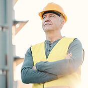 Construction worker, senior man and architecture, building industry and ...