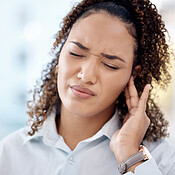 Injury, earache and medical with woman in pain for tinnitus, sound and ...