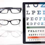 Optometry, glasses and letter for eye exam on tablet for sight, vision ...