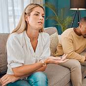 Interracial couple, counseling and frustrated woman and black man on ...