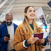 Travel, ticket and smile with woman in airport for vacation ...
