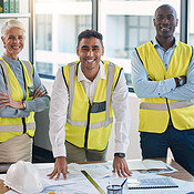 Team, portrait and engineering management staff with construction gear ...