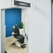 Ophthalmology, consultation and sign for an empty room for healthcare ...