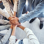 Diversity, stack of hands and business people in the office in unity ...