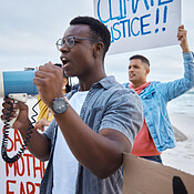 Protest, climate change and megaphone with black man at the beach for ...