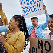 Protest, climate change and megaphone with black woman at the beach for ...