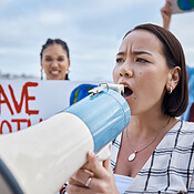 Climate change, megaphone and Asian woman protest with crowd protesting ...