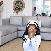Hiding, counting and family playing a game in the living room for ...