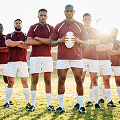 Rugby, grass and portrait of men, team with ball and standing together ...