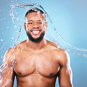 Muscle, portrait and water on man cleaning, hygiene and skincare ...