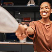 Handshake, interview and black woman meeting an employee for a deal ...