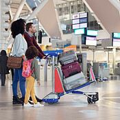 Travel with parents, mom with child at airport and immigration farewell ...