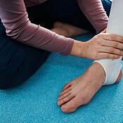 Injury, hurt and foot or ankle pain for athlete getting help from coach ...