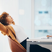 Relax, business and a black woman finished with tasks in the office ...