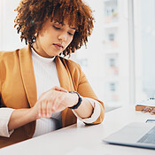 Black woman, time management and check watch with schedule and clock ...