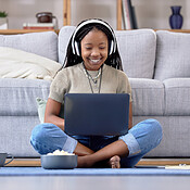 Black woman, student and laptop with smile for elearning, education or ...