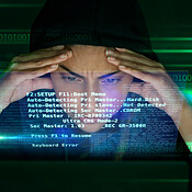 Hacker, code and stress with cyber crime, fear of getting caught and ...