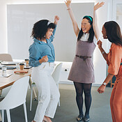 Teamwork, hands huddle and business people dance celebrating goals ...