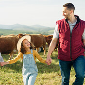 Farmer family, cow farm and field walk with girl and parents bonding in ...