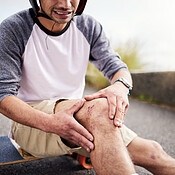 Injury, man and knee pain after skateboarding accident, practice and ...
