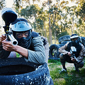 Team, paintball and tires for cover, hiding or protection while firing ...