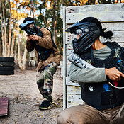 Sports, paintball and woman with gun for battle, game or competition ...