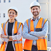 Proud portrait of engineering people in outdoor, construction site ...