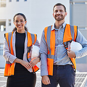 Team portrait of engineering people in outdoor, construction site ...
