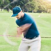 Golf, motion blur and hobby with a sports man swinging a club on a ...