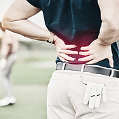 Sports, injury and man on golf course with back pain during game ...