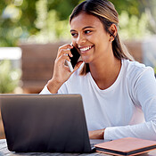 Study, phone call and laptop with Indian woman at cafe for remote ...