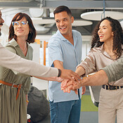 Office, teamwork and happy employees in huddle with hands together and excited at startup team ...